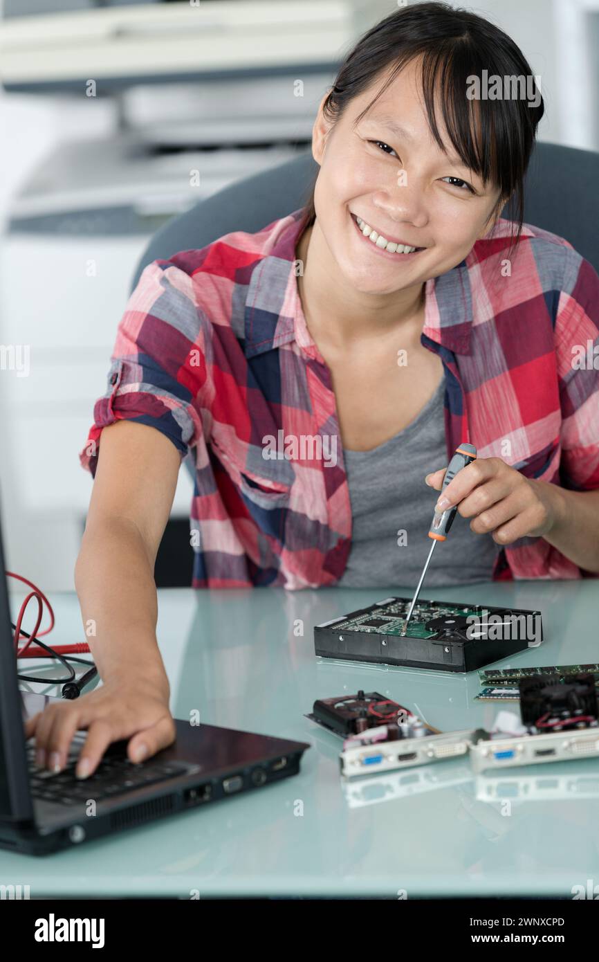 Young technician using multimeter hi-res stock photography and images ...