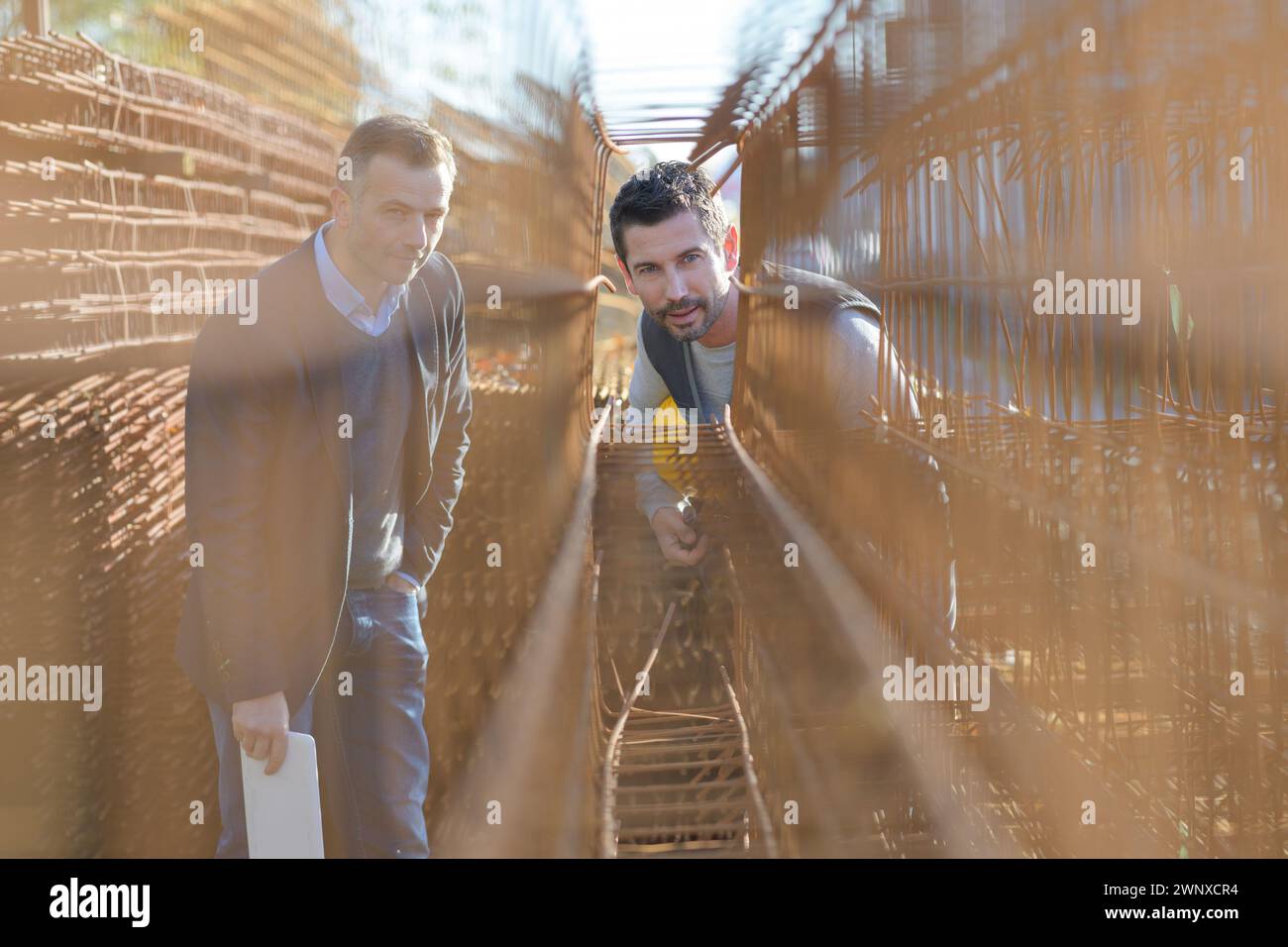 portrait of warehouse workers outside factory Stock Photo - Alamy