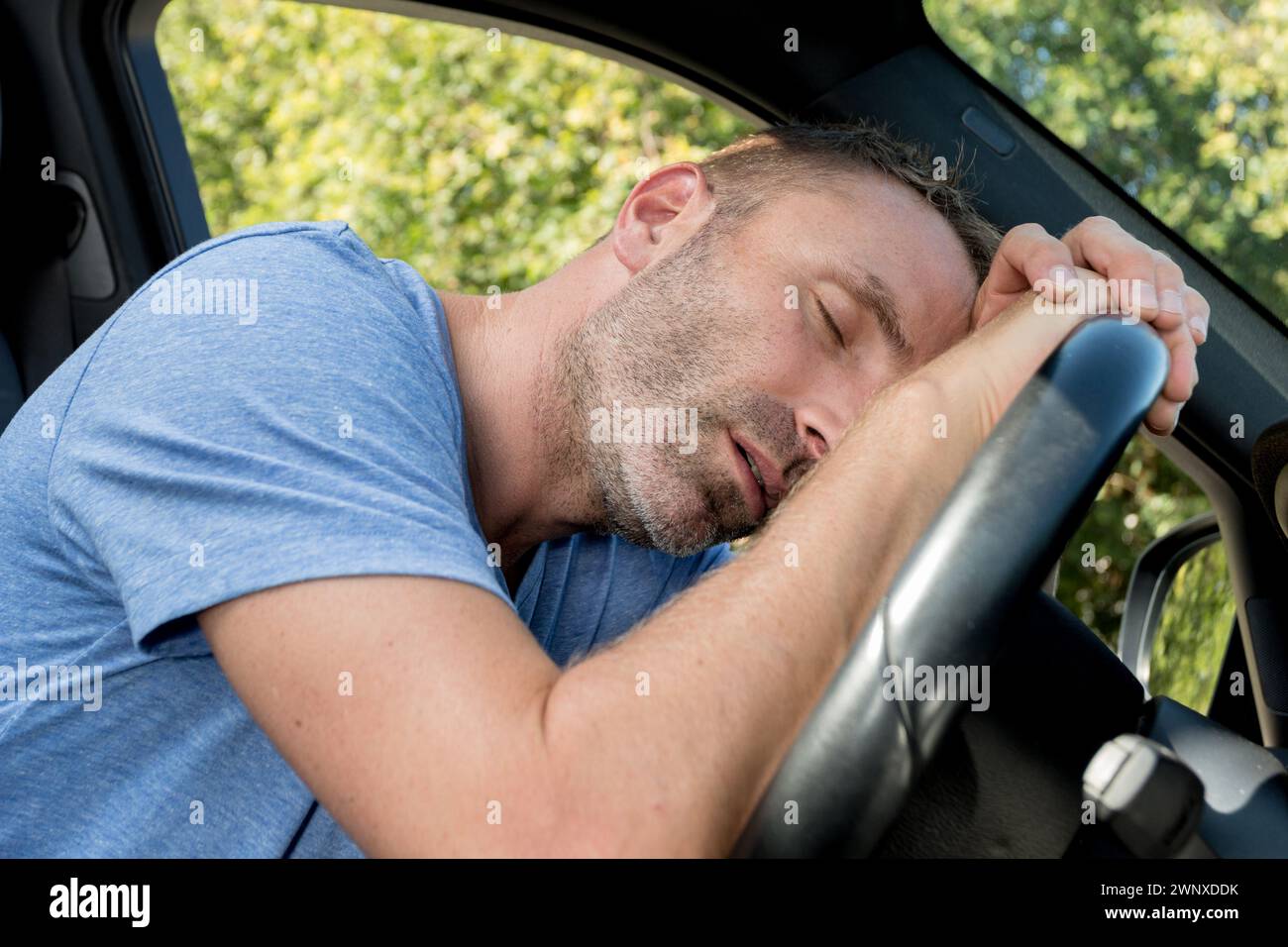 Slumped over hi-res stock photography and images - Alamy