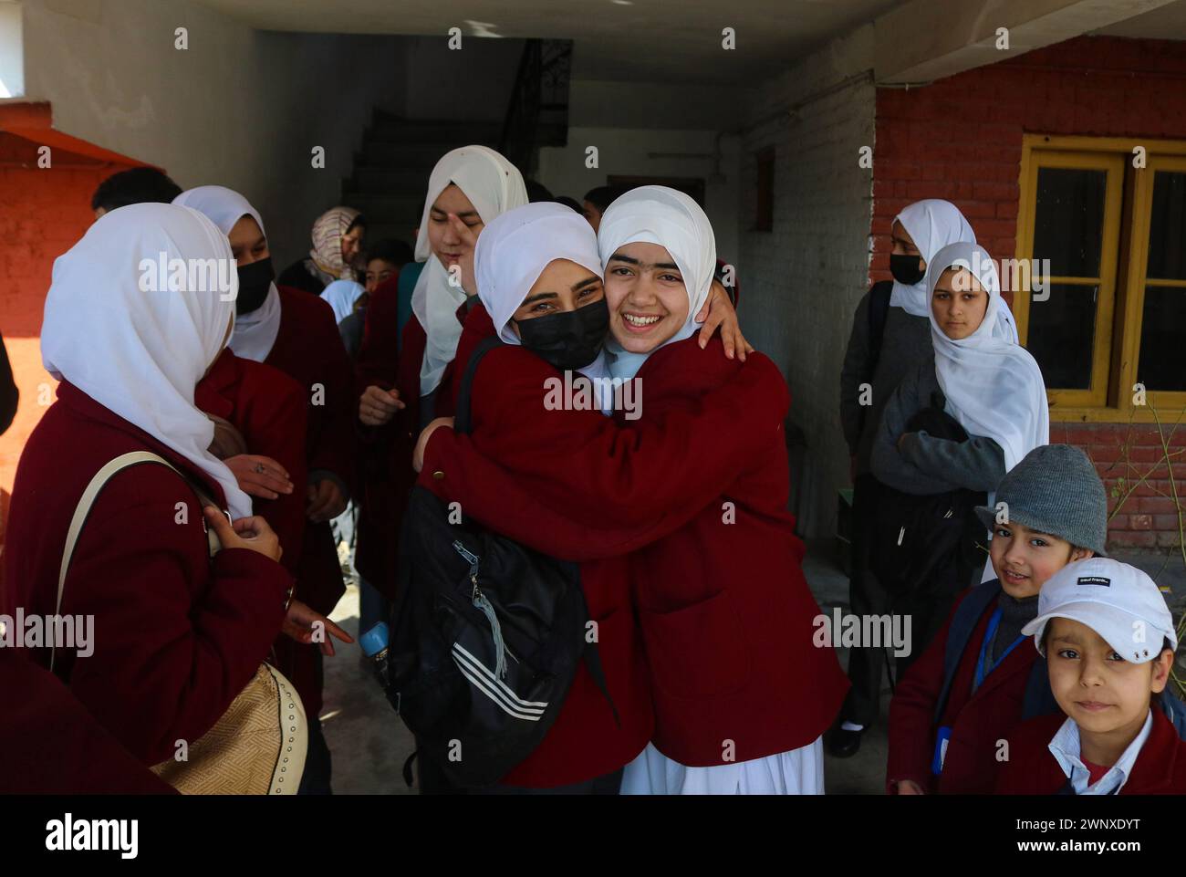 Srinagar, India. 04th Mar, 2024. A student greet each other during the ...