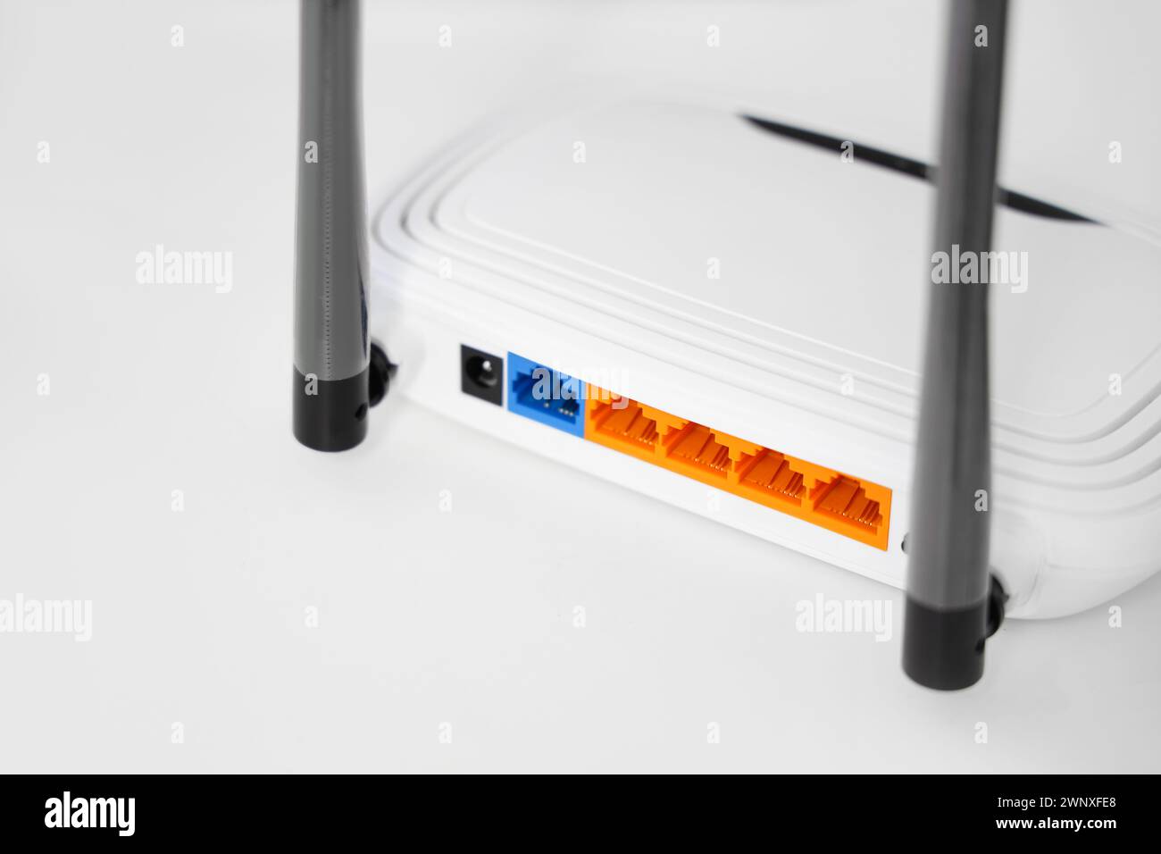 Modern wi-fi router on white table, closeup Stock Photo - Alamy