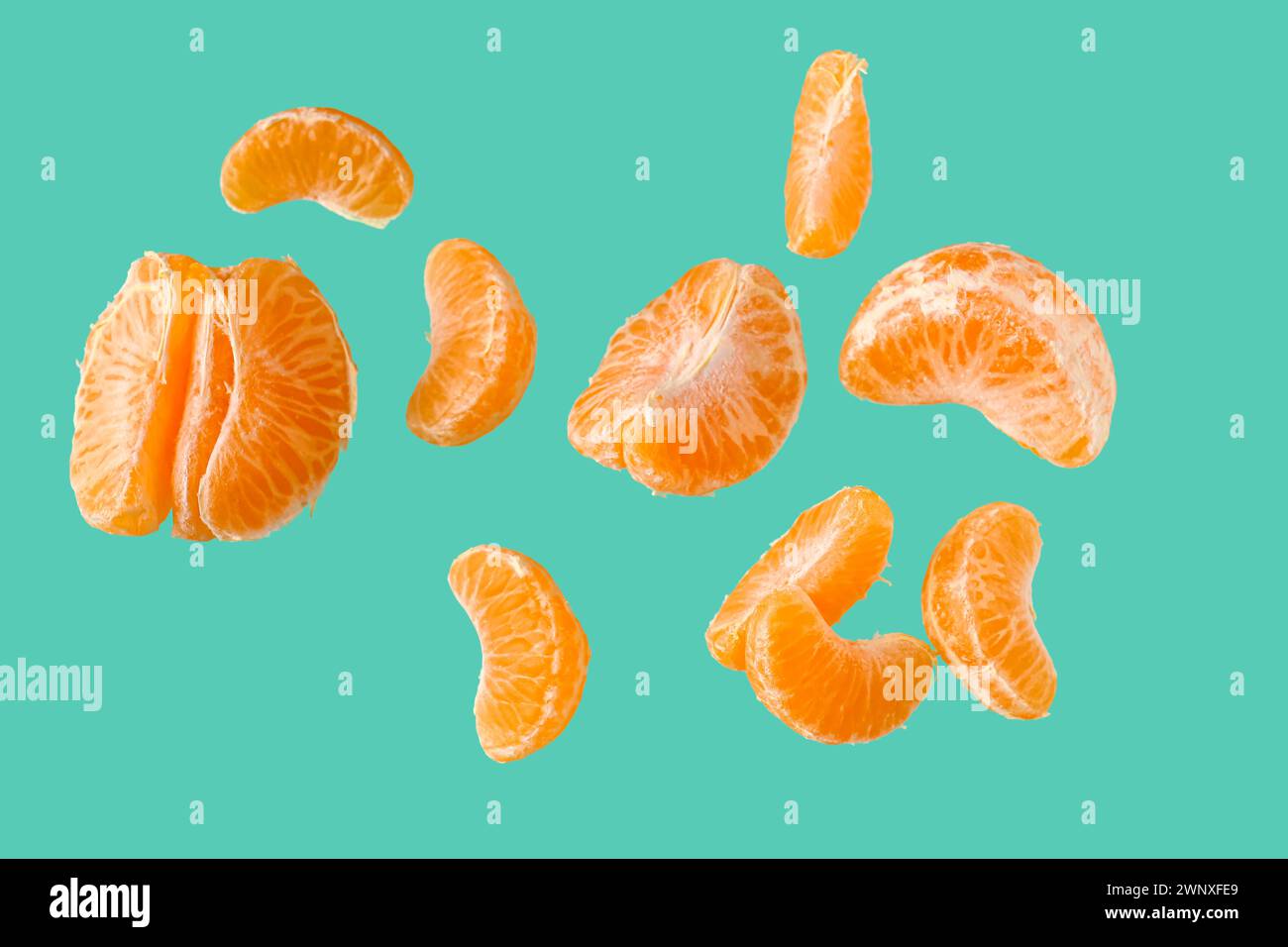 Falling mandarin slices on hi-res stock photography and images - Alamy
