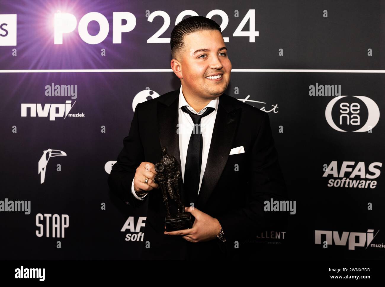 LEUSDEN - Marco Schuitmaker with a prize on the red carpet of the ...