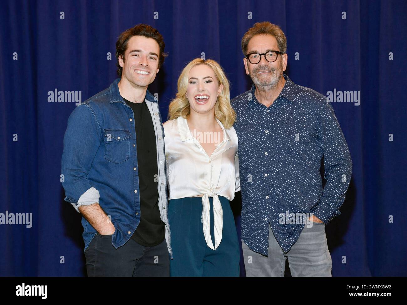 Cast members Corey Cott, left, and McKenzie Kurtz pose with singer ...