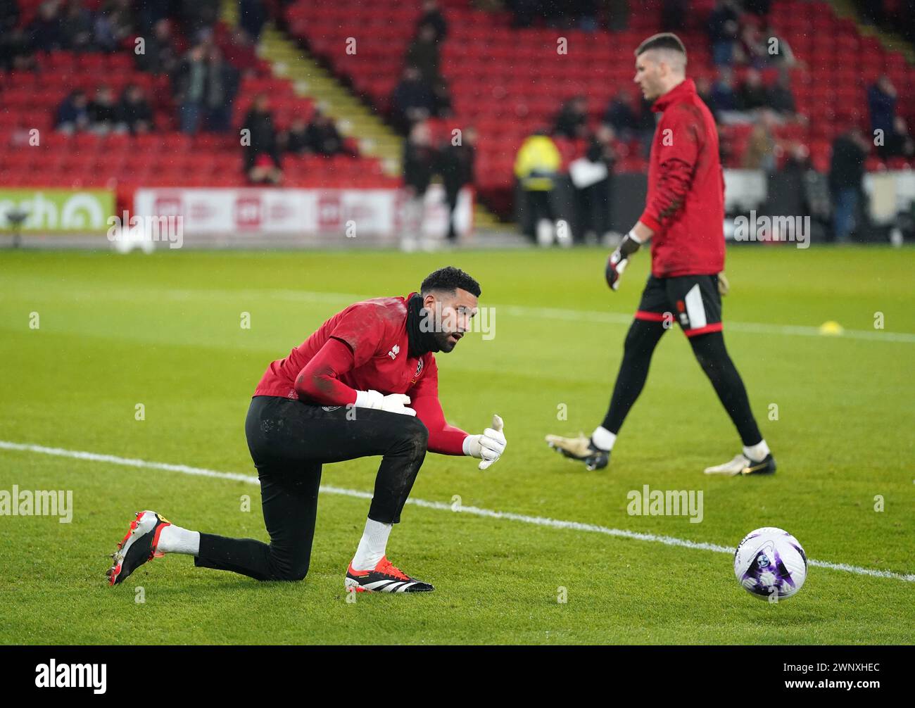 Sheffield United goalkeepers Wes Foderingham and Ivo Grbic warming up ...