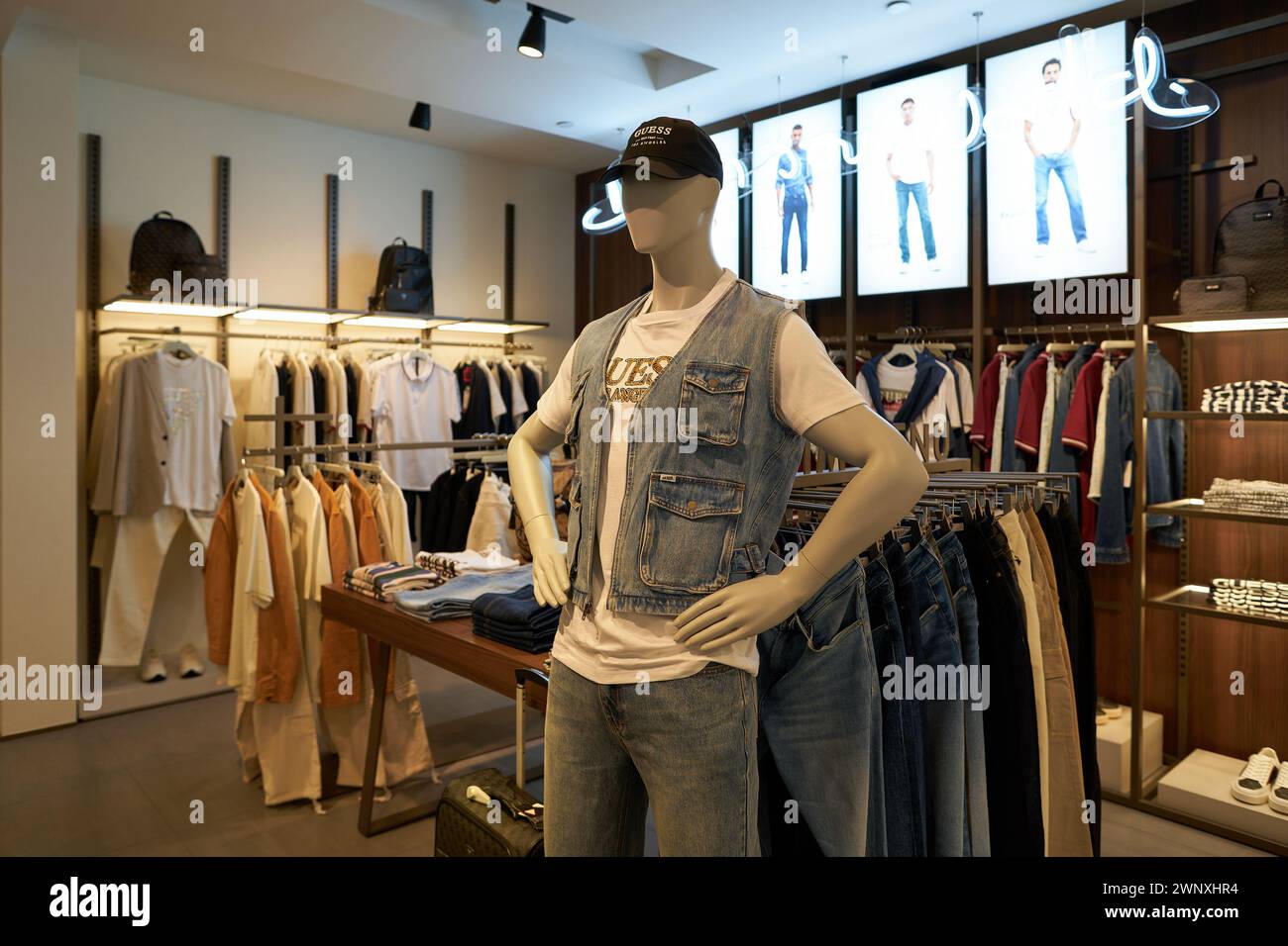SINGAPORE - NOVEMBER 06, 2023: dressed mannequin displayed at Guess ...