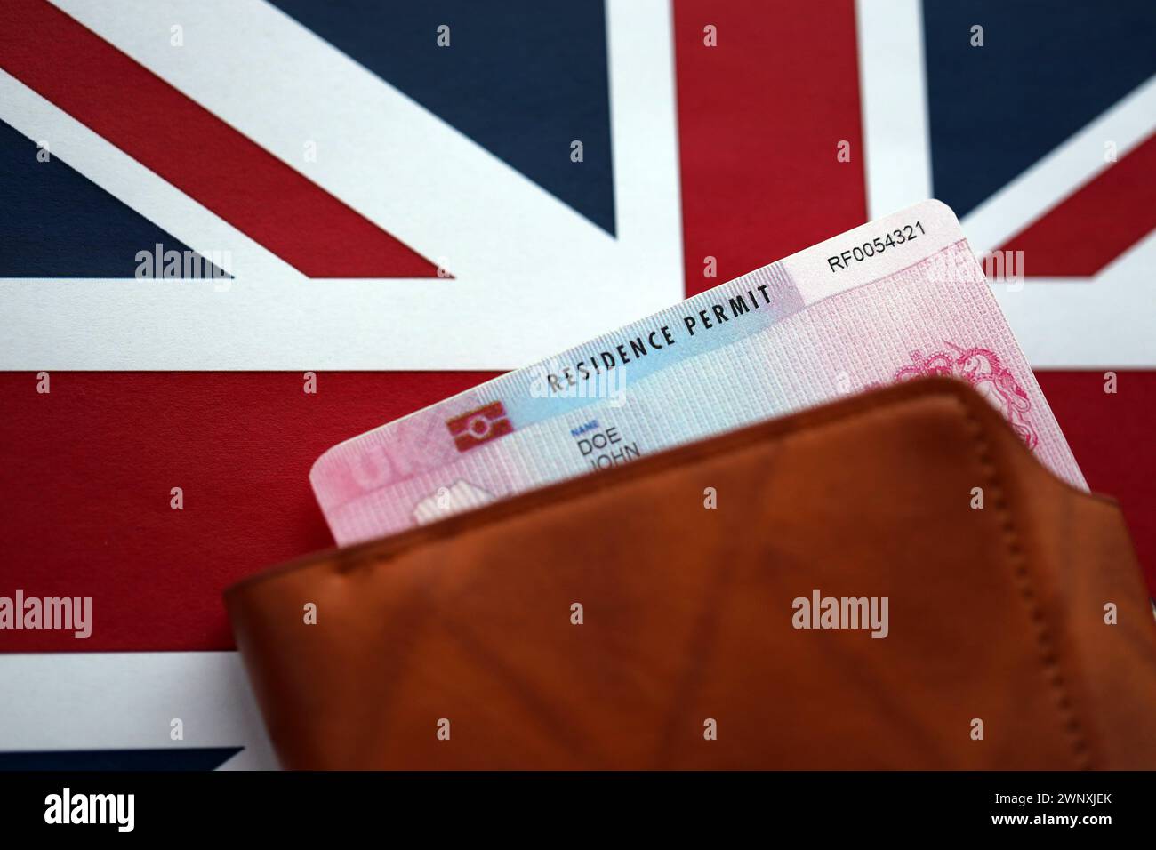Residence Permit BRP card in purse on Union Jack flag close up Stock ...
