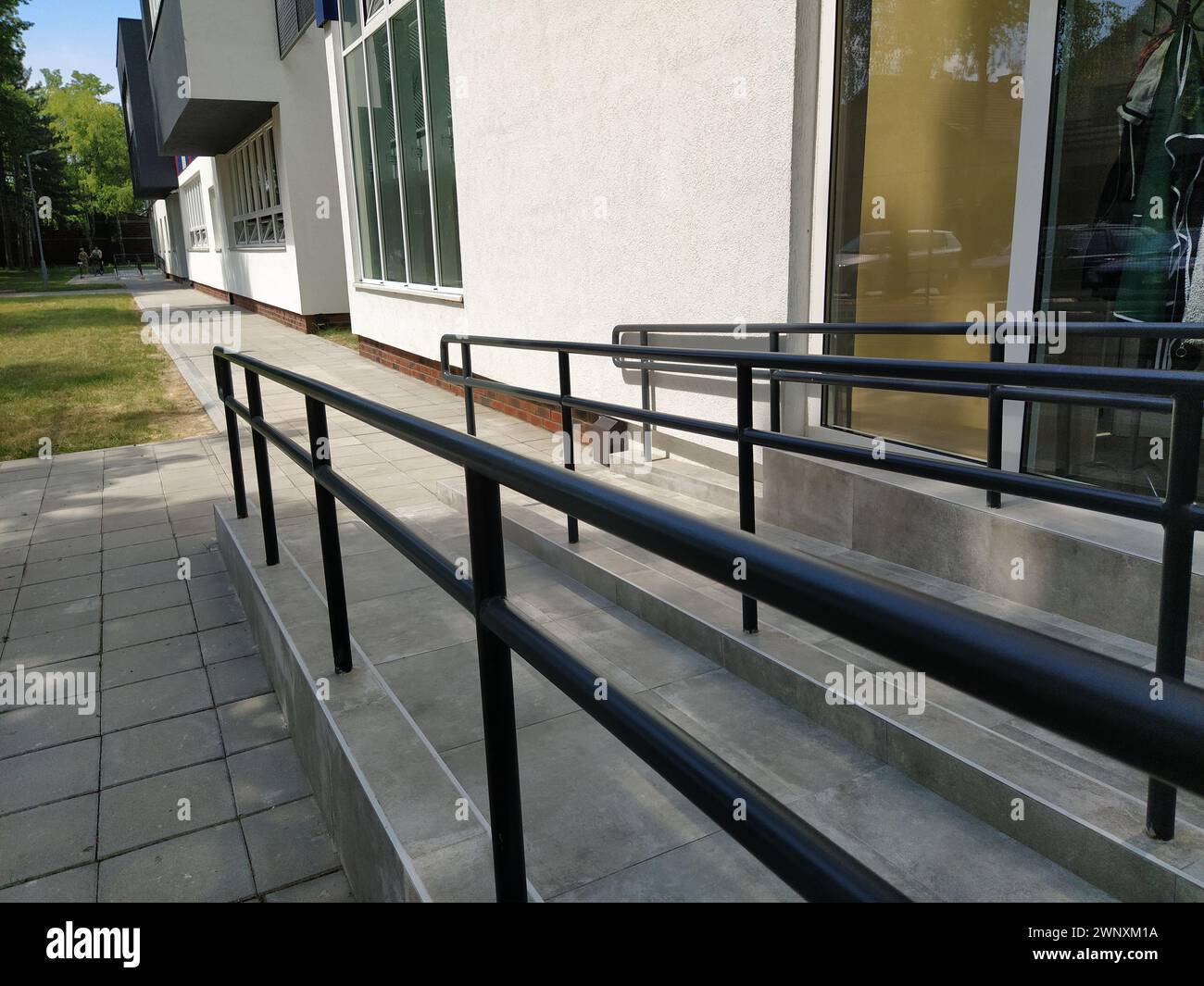 Disabled ramps next to the building's entrance. New school equipped ...
