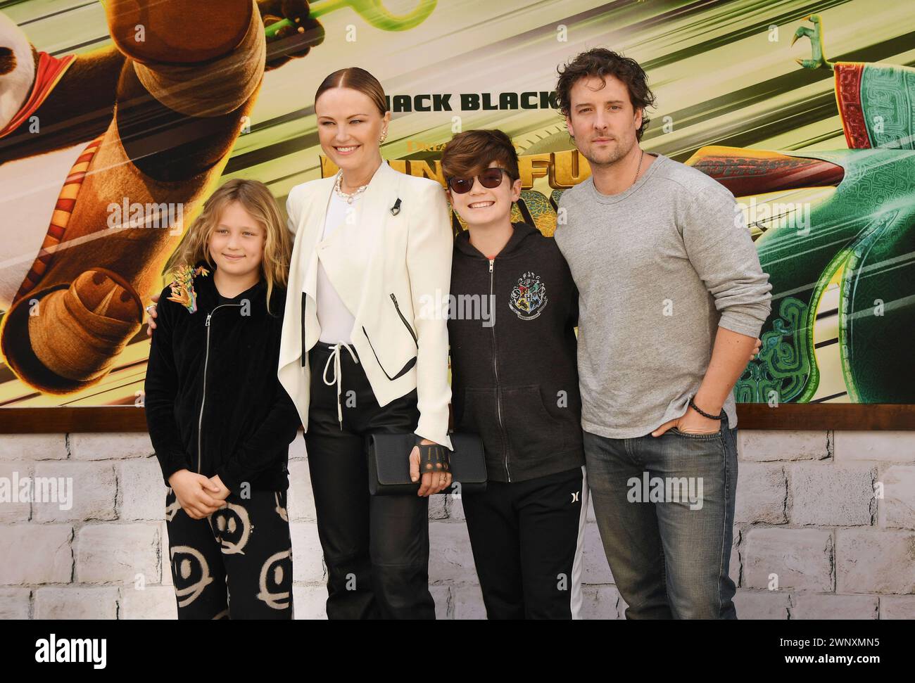 LOS ANGELES, CALIFORNIA - MARCH 03: (L-R) Sebastian Zincone, Malin ...
