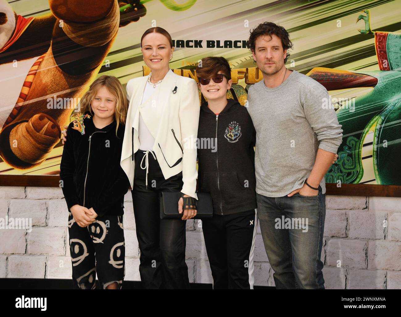 LOS ANGELES, CALIFORNIA - MARCH 03: (L-R) Sebastian Zincone, Malin ...