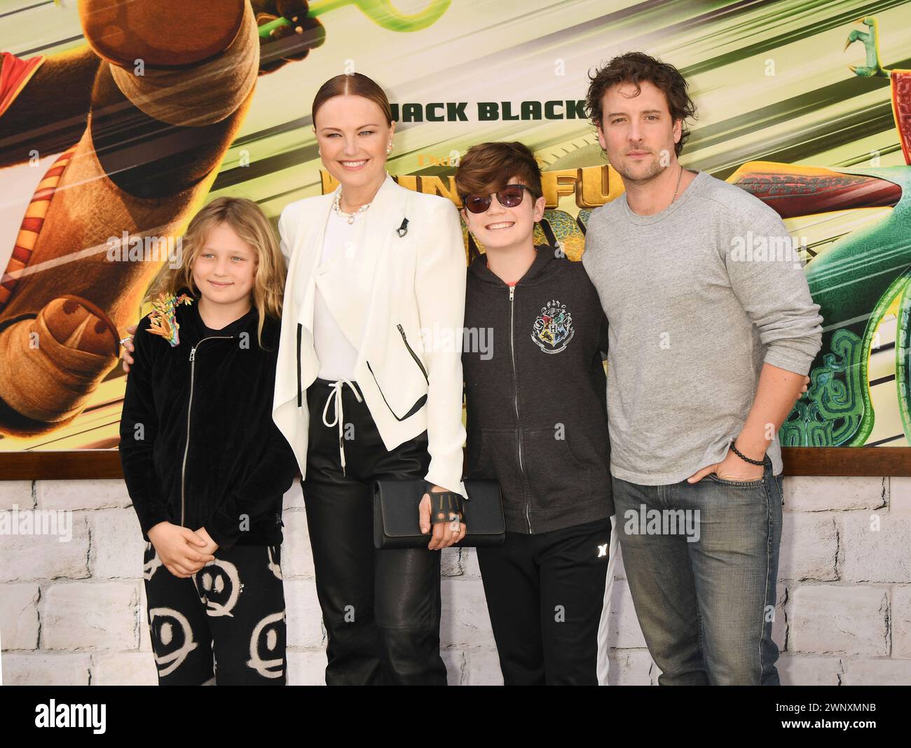 LOS ANGELES, CALIFORNIA - MARCH 03: (L-R) Sebastian Zincone, Malin ...