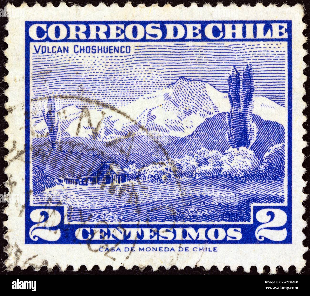 CHILE - CIRCA 1960: A stamp printed in Chile shows Choshuenco volcano ...