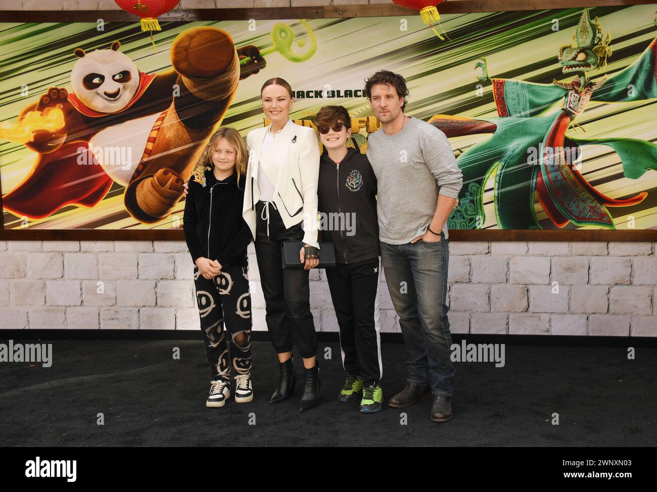 LOS ANGELES, CALIFORNIA - MARCH 03: (L-R) Sebastian Zincone, Malin ...