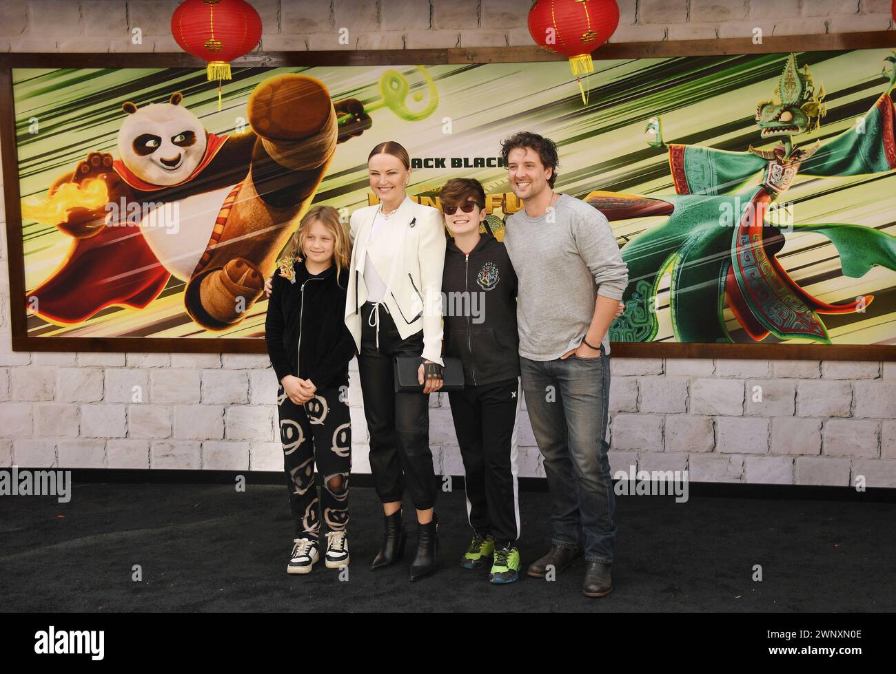 LOS ANGELES, CALIFORNIA - MARCH 03: (L-R) Sebastian Zincone, Malin ...
