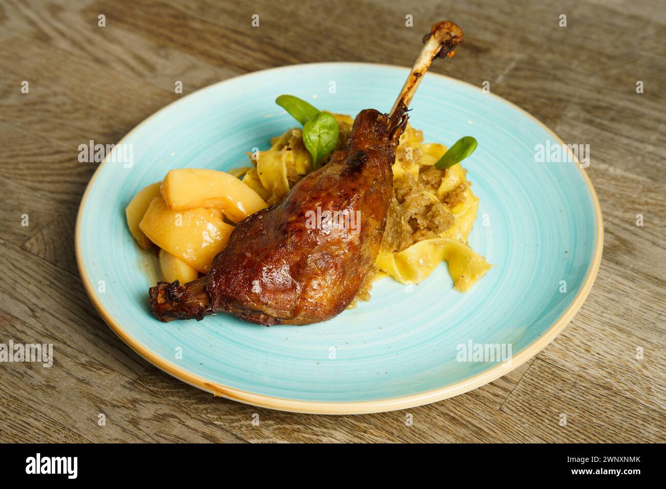 Roasted goose leg with cabbage papardelle pasta and quince compote ...
