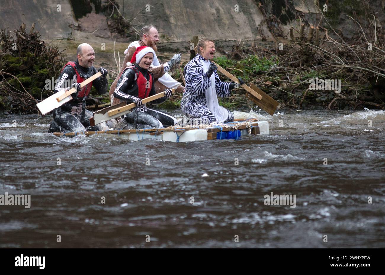 26/12/15 The first raft takes on the weir. Dozens of competitors are ...