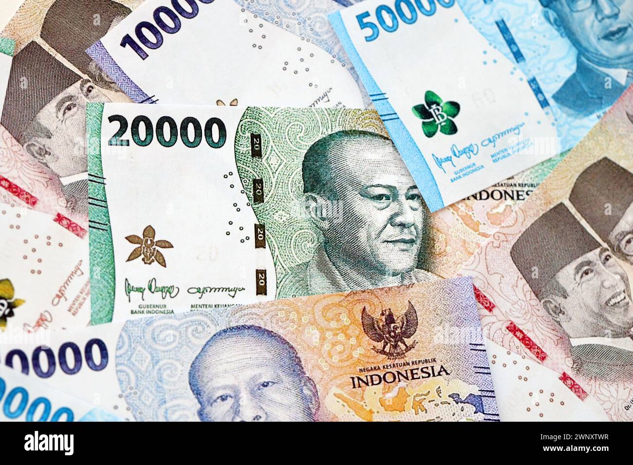 Background image of many indonesian rupiah money bills of new series ...