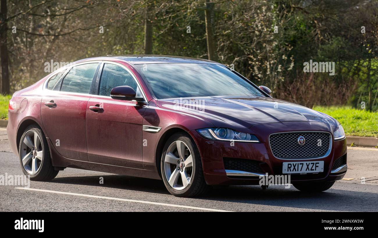 Milton Keynes,UK-Mar 4th 2024:2017 red diesel engine Jaguar XF car ...