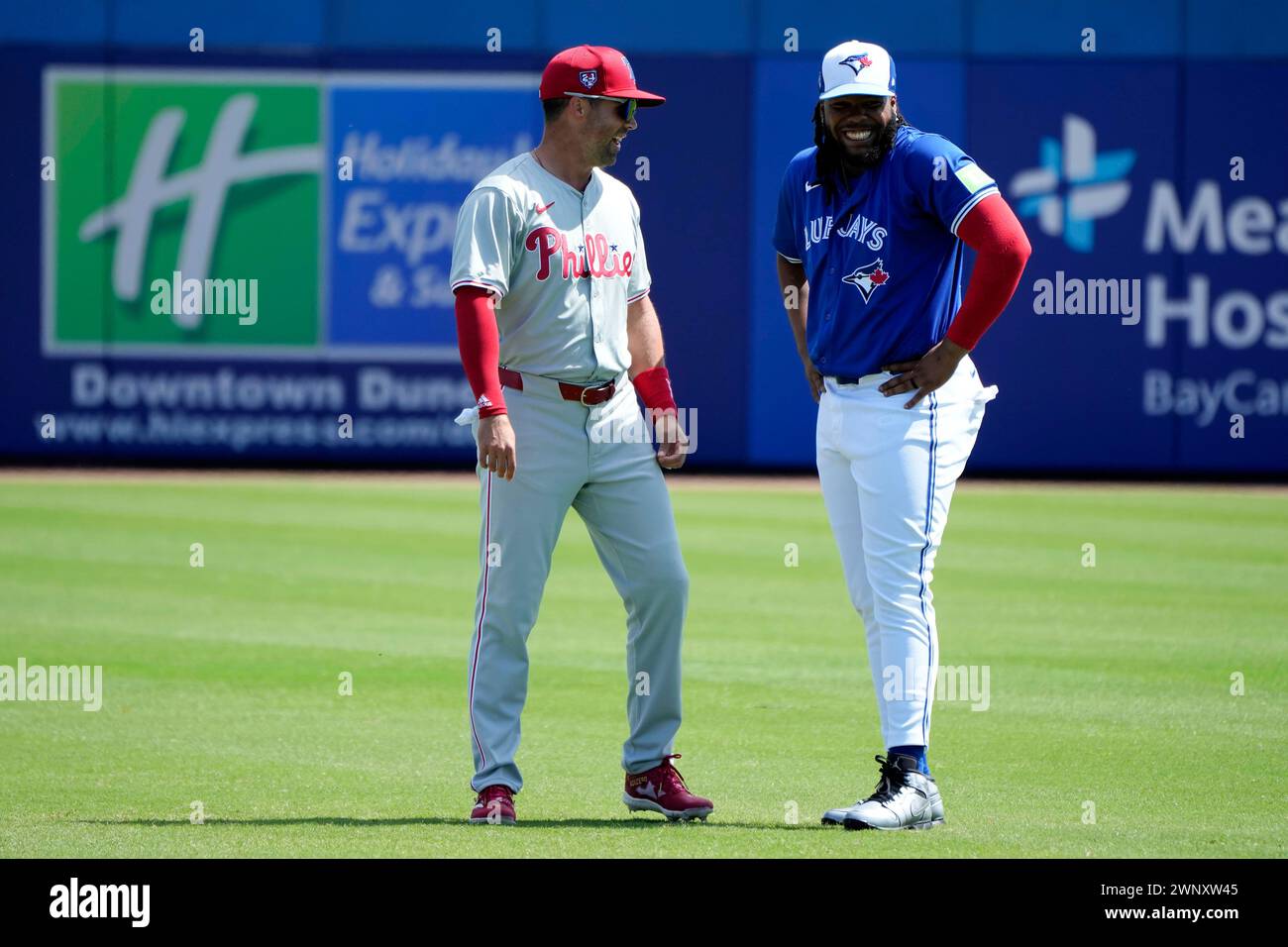 Philadelphia Phillies left fielder Whit Merrifield, left, talks with ...