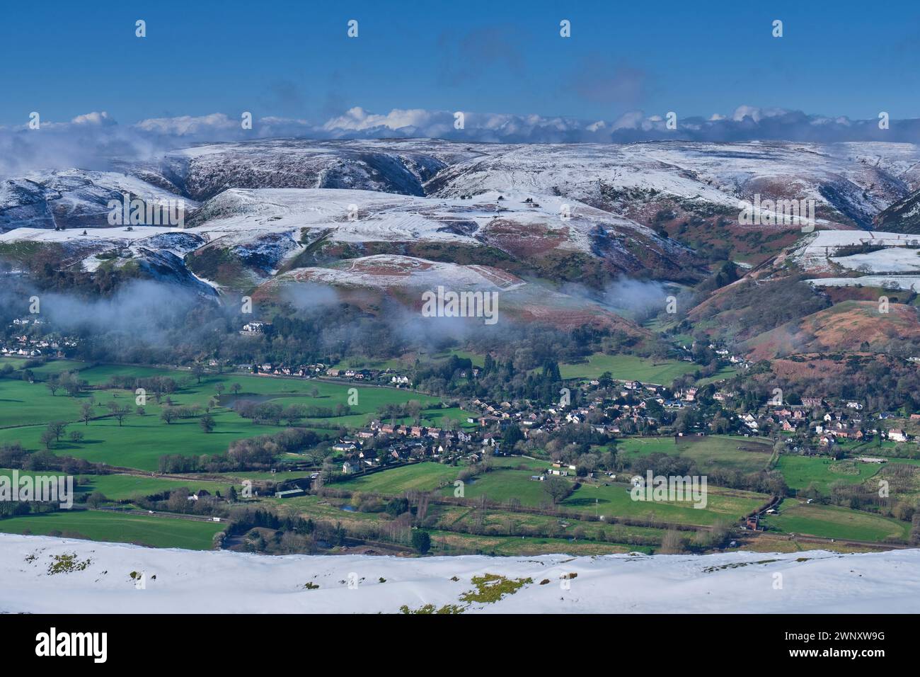 All Stretton and a snow-capped Long Mynd, seen from a snowy Caer ...