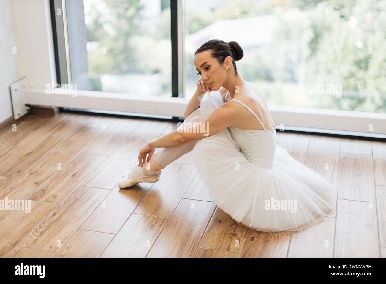 Side view portrait of talented ballerina finished her wonderful ...