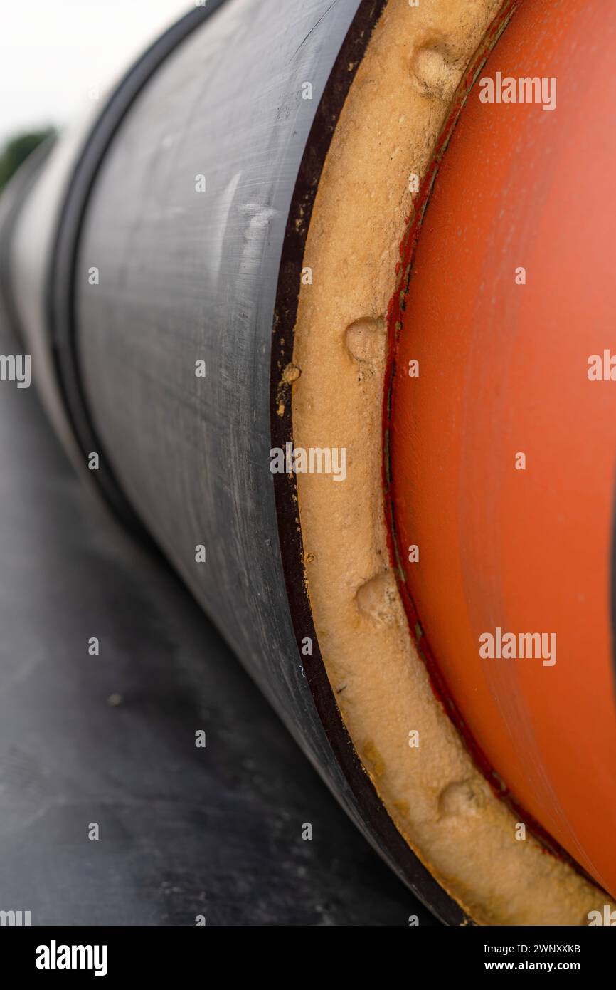 Steel pipe with heat insulation on construction site close up Stock ...