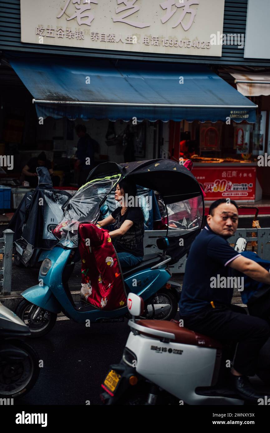 scooter on the streets of Suzhou Stock Photo - Alamy