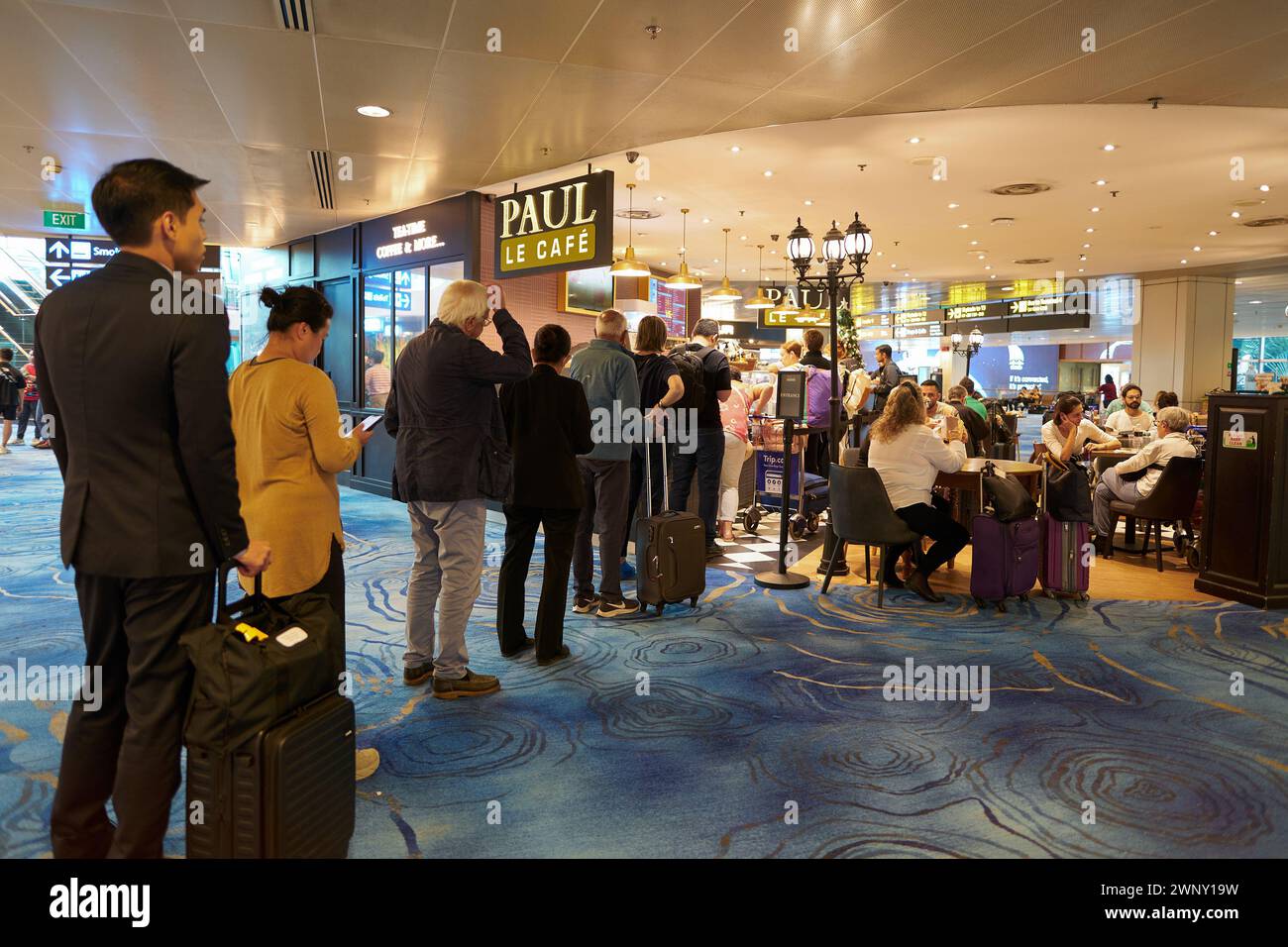 SINGAPORE - NOVEMBER 06, 2023: people standing in line at Paul Le Cafe ...