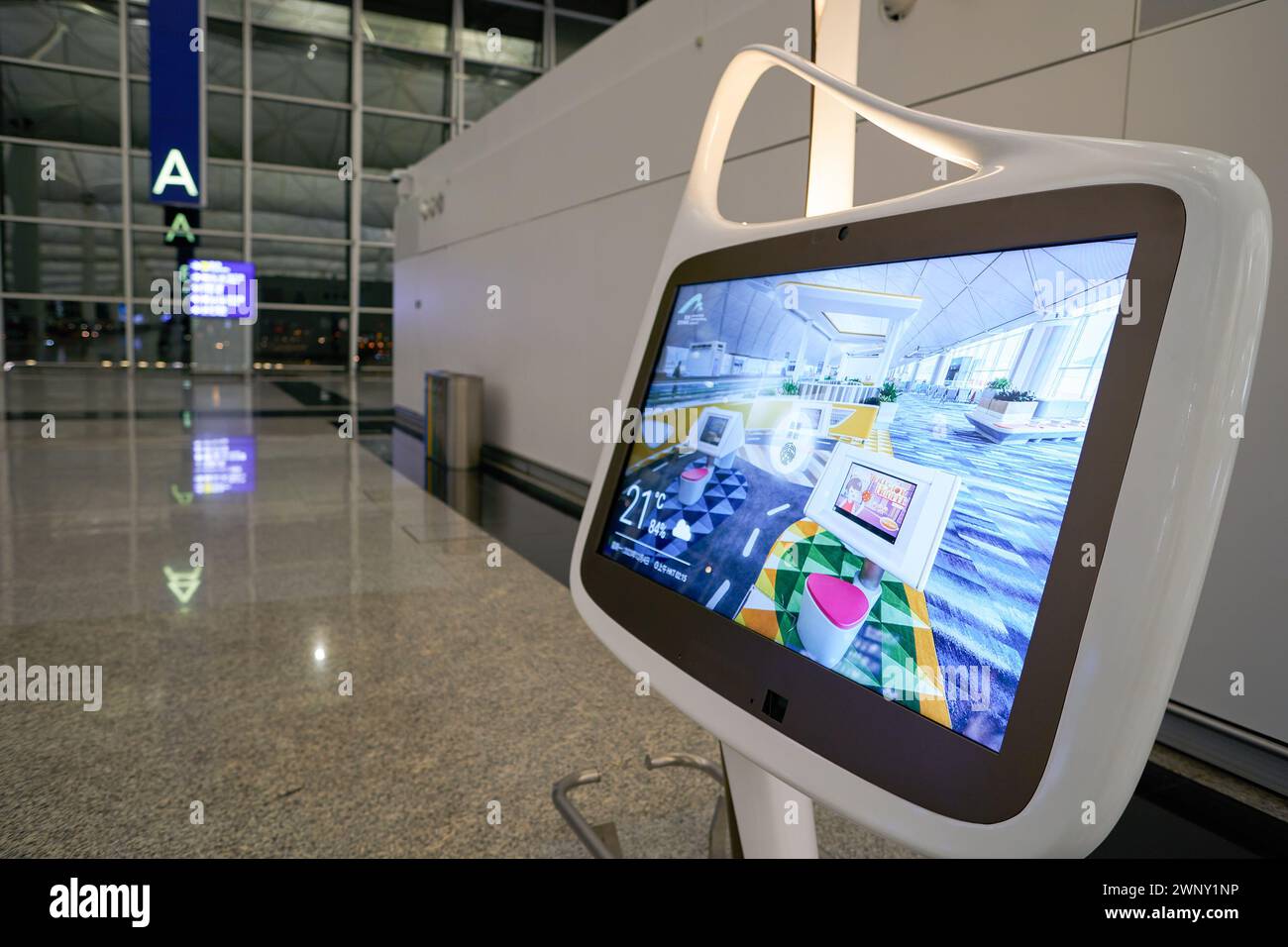HONG KONG, CHINA - DECEMBER 04, 2023: interactive self service information kiosk at check-in ...