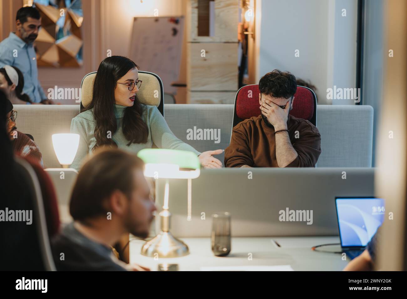 Office setting and woman and concerned hi-res stock photography and ...