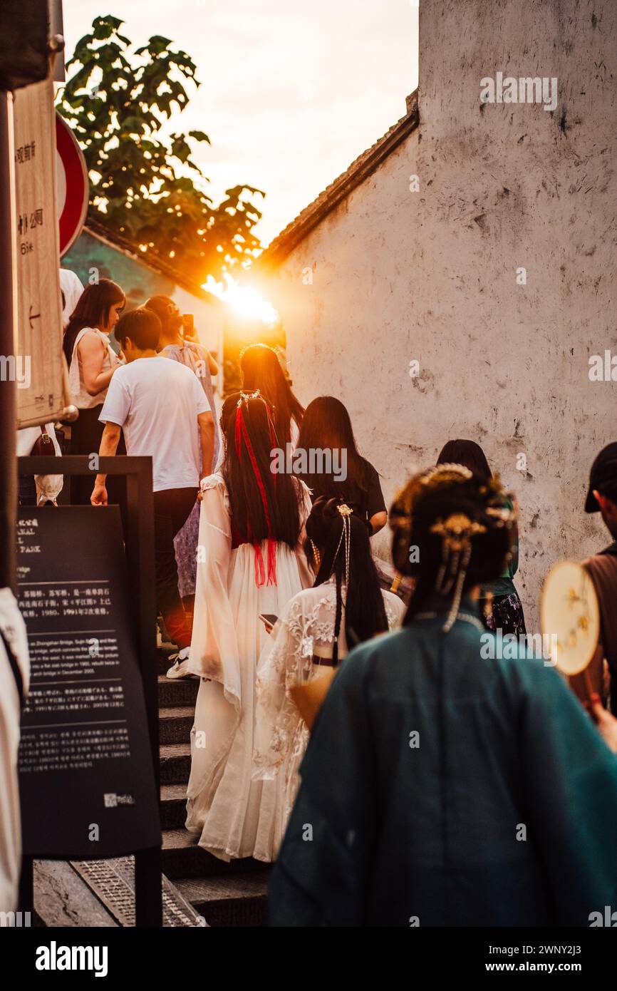 People walking on the stairs in Suzhou old town Stock Photo - Alamy