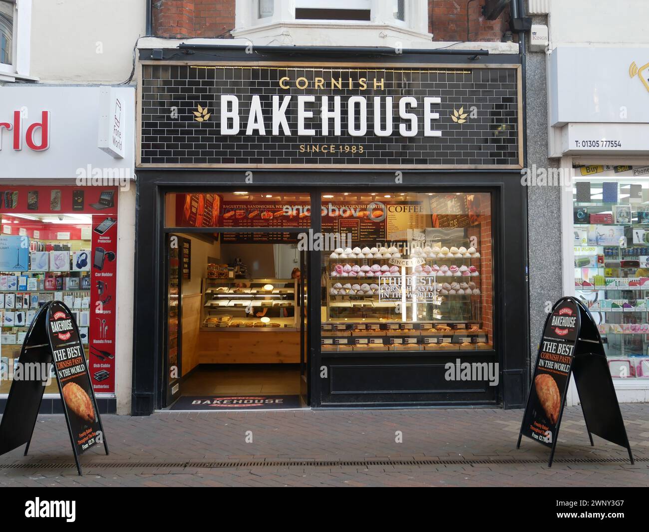 The Cornish Bakehouse, one of many shops in St. Mary Street in Weymouth ...