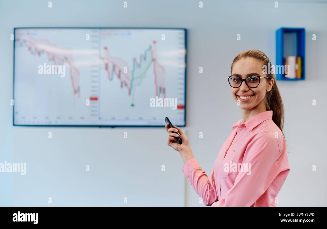 On Stage, Successful Female Speaker Presents Technological Product ...