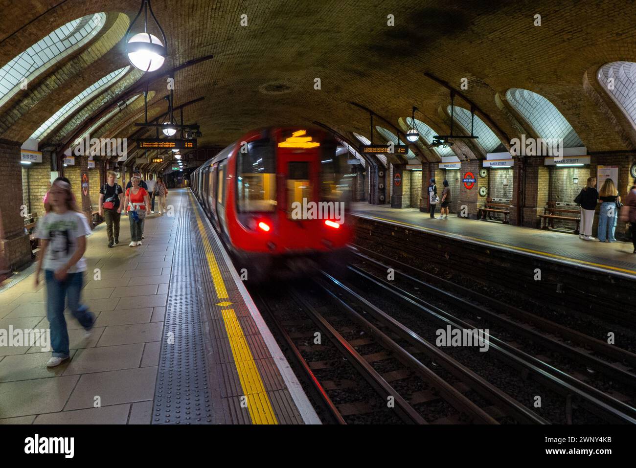 A train leaving Baker Street underground station, one of the oldest ...