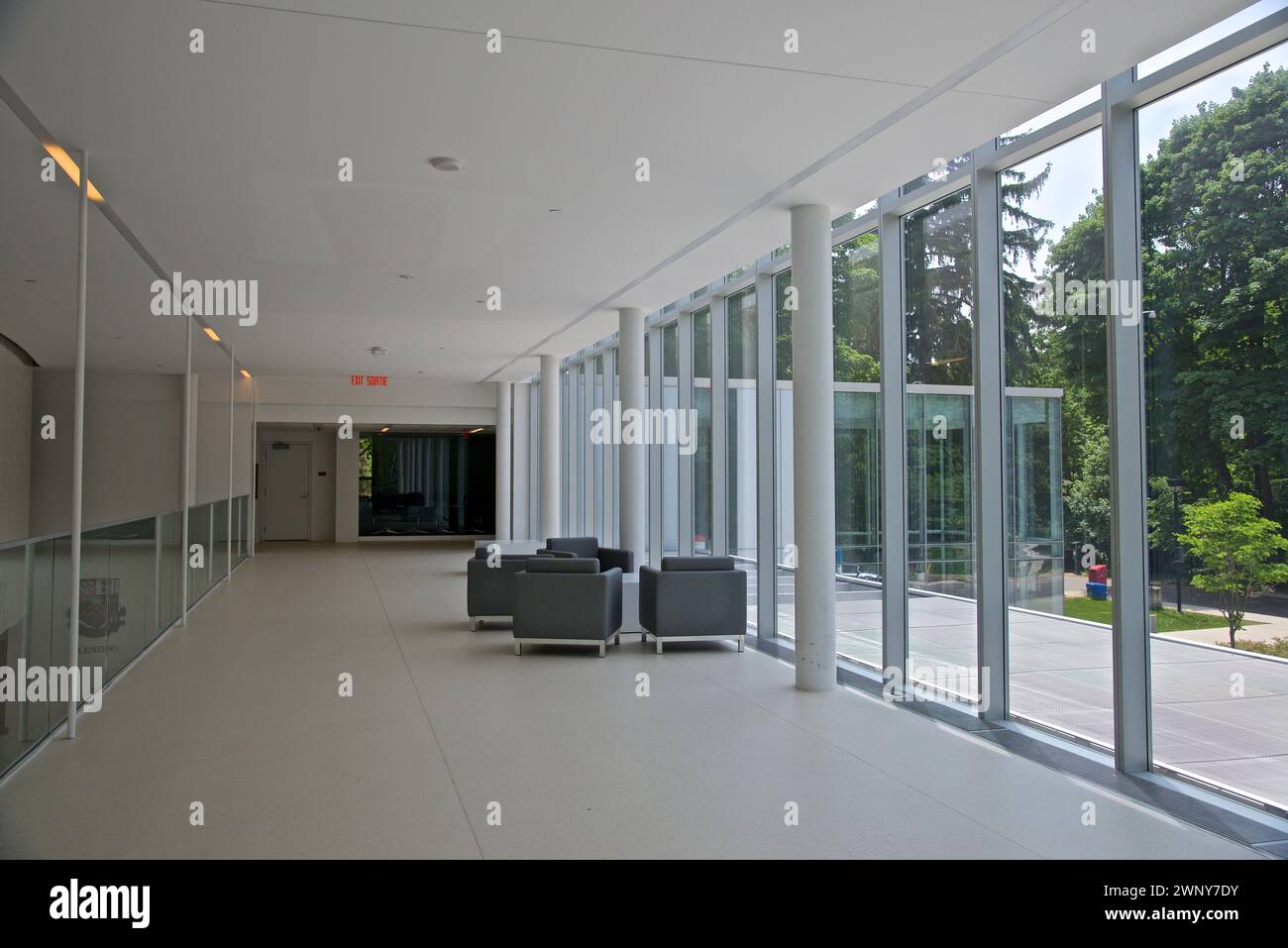 Interior of a building entrance with a long corridor - Contemporary ...
