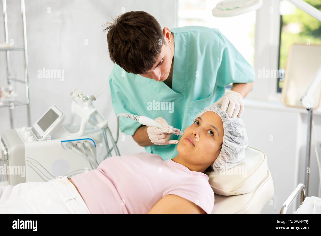 Using device and hydrogen oxygen cleaning attachment Stock Photo - Alamy