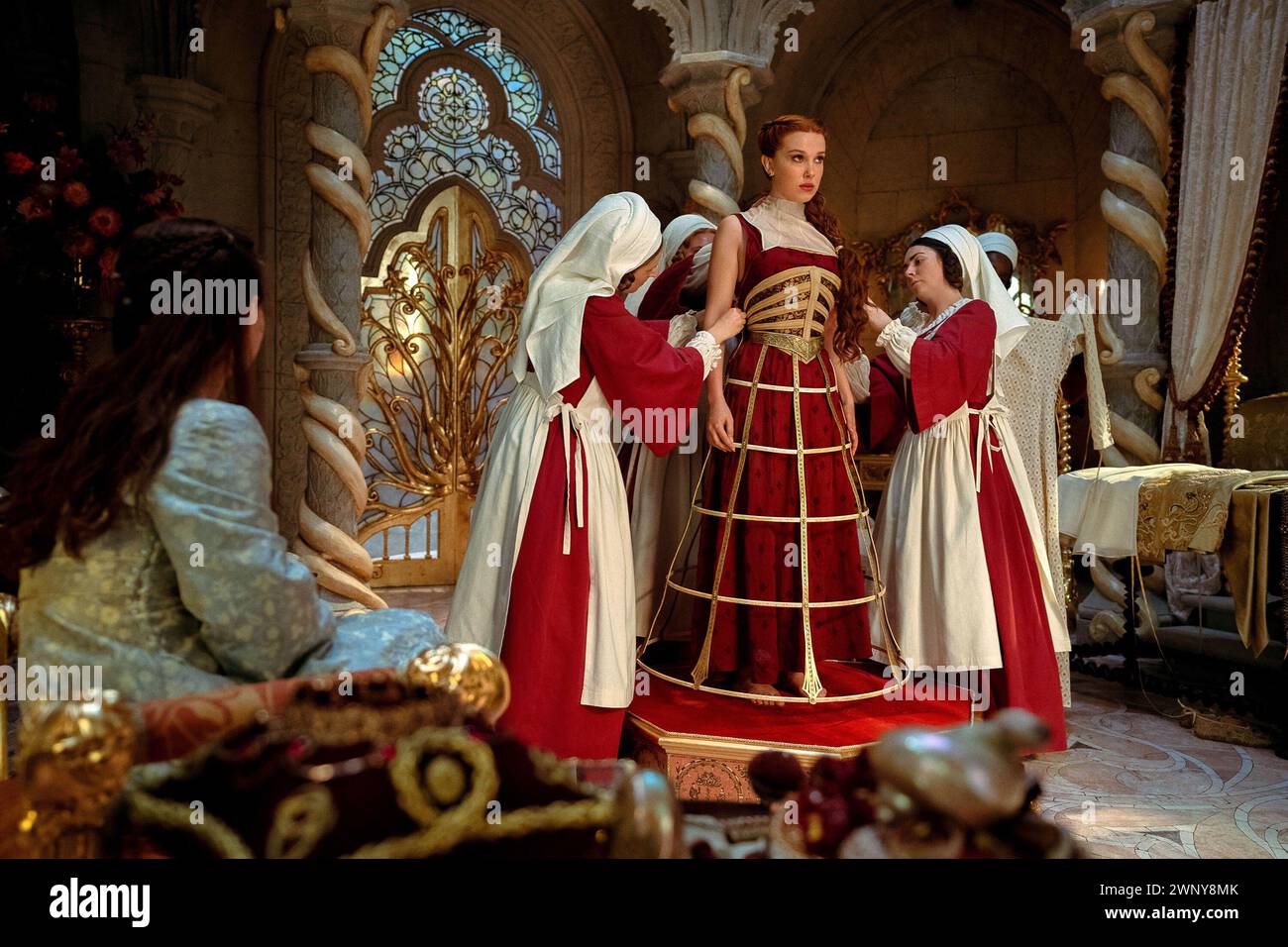 DAMSEL, Brooke Carter (left), Millie Bobby Brown (center), 2024. ph ...