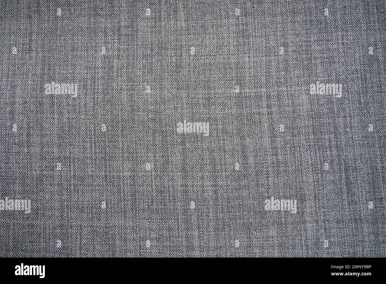 gray background fabric texture. A piece of woolen cloth is neatly laid ...