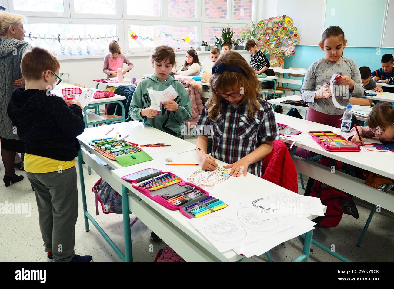 Children 9-10 years old, boys and girls, make homemade crafts at the ...