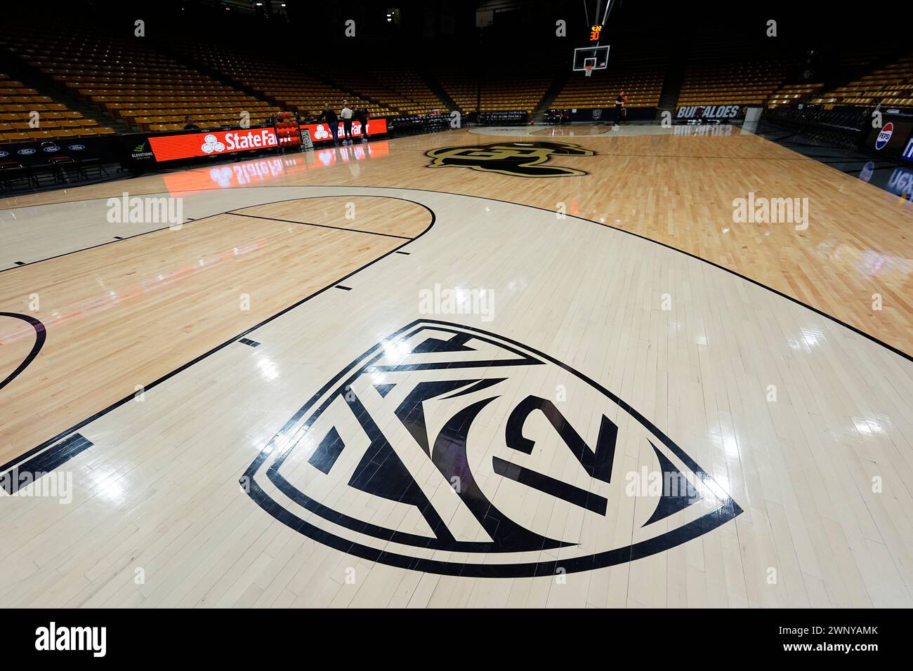 The PAC-12 logo is displayed on the floor of the Events Center before ...