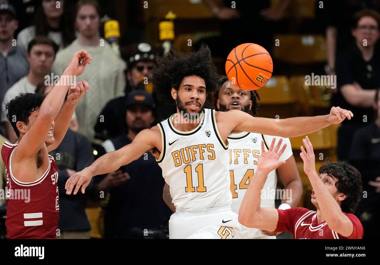 Colorado guard Javon Ruffin (11) and Stanford forward Brandon Angel (23 ...