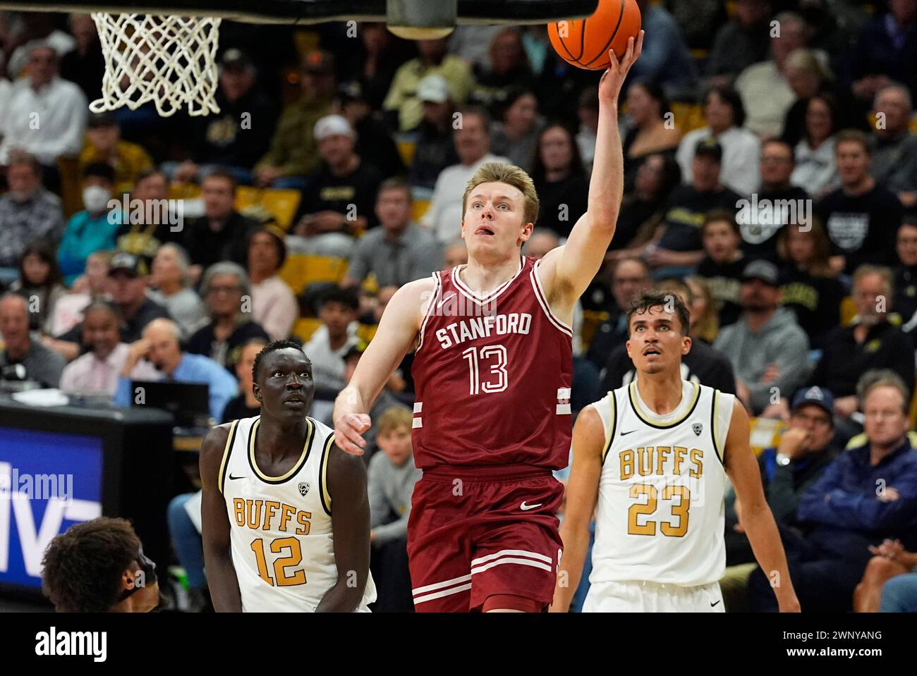Stanford guard Michael Jones (13) goes up for a basket past Colorado ...