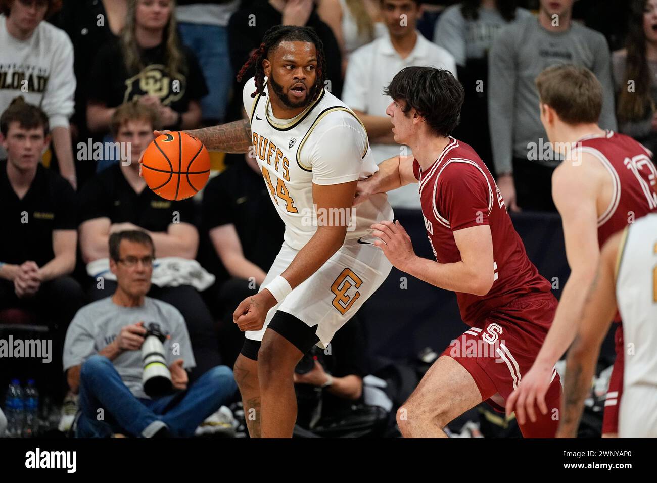 Colorado center Eddie Lampkin Jr. (44) and Stanford forward Maxime ...