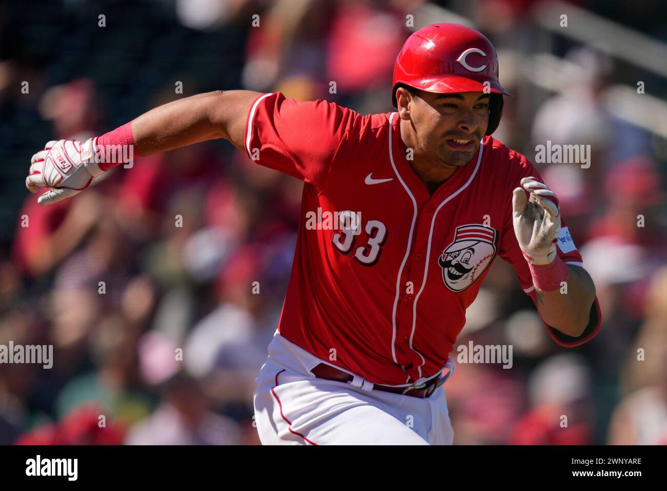 Cincinnati Reds' Christian Encarnacion-Strand runs toward first base ...