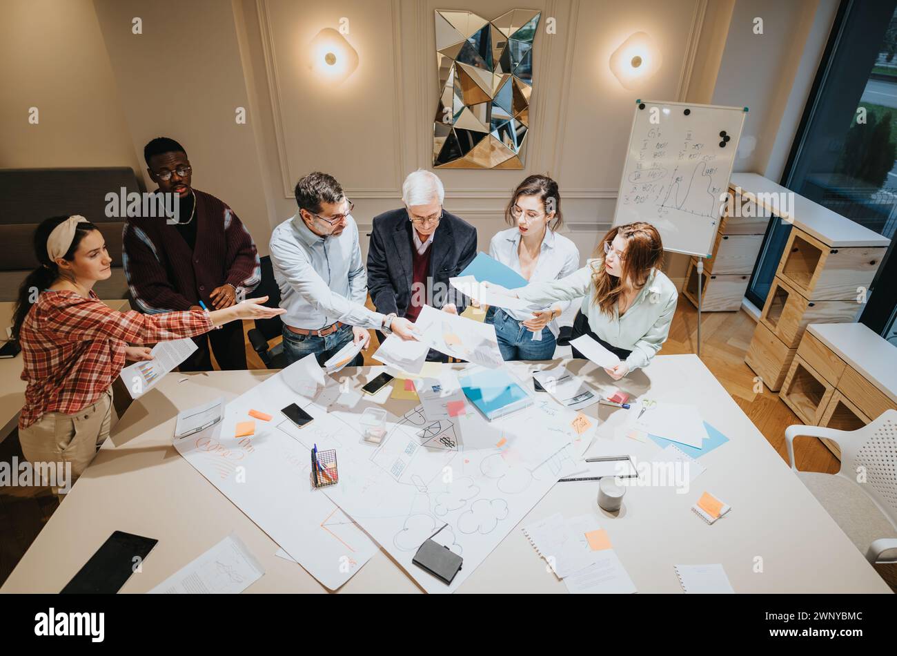 Multigenerational teamwork hi-res stock photography and images - Alamy