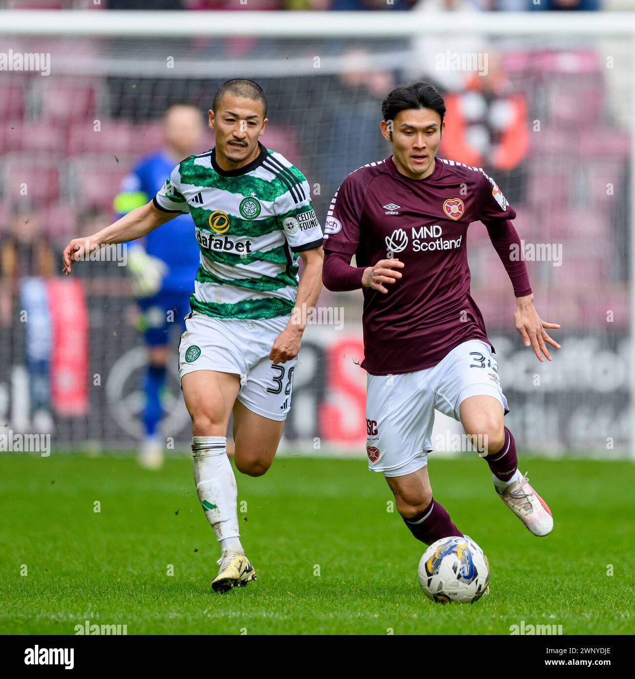 Daizen Maeda of Celtic and Kyosuke Tagawa of Hearts, Japanese players ...