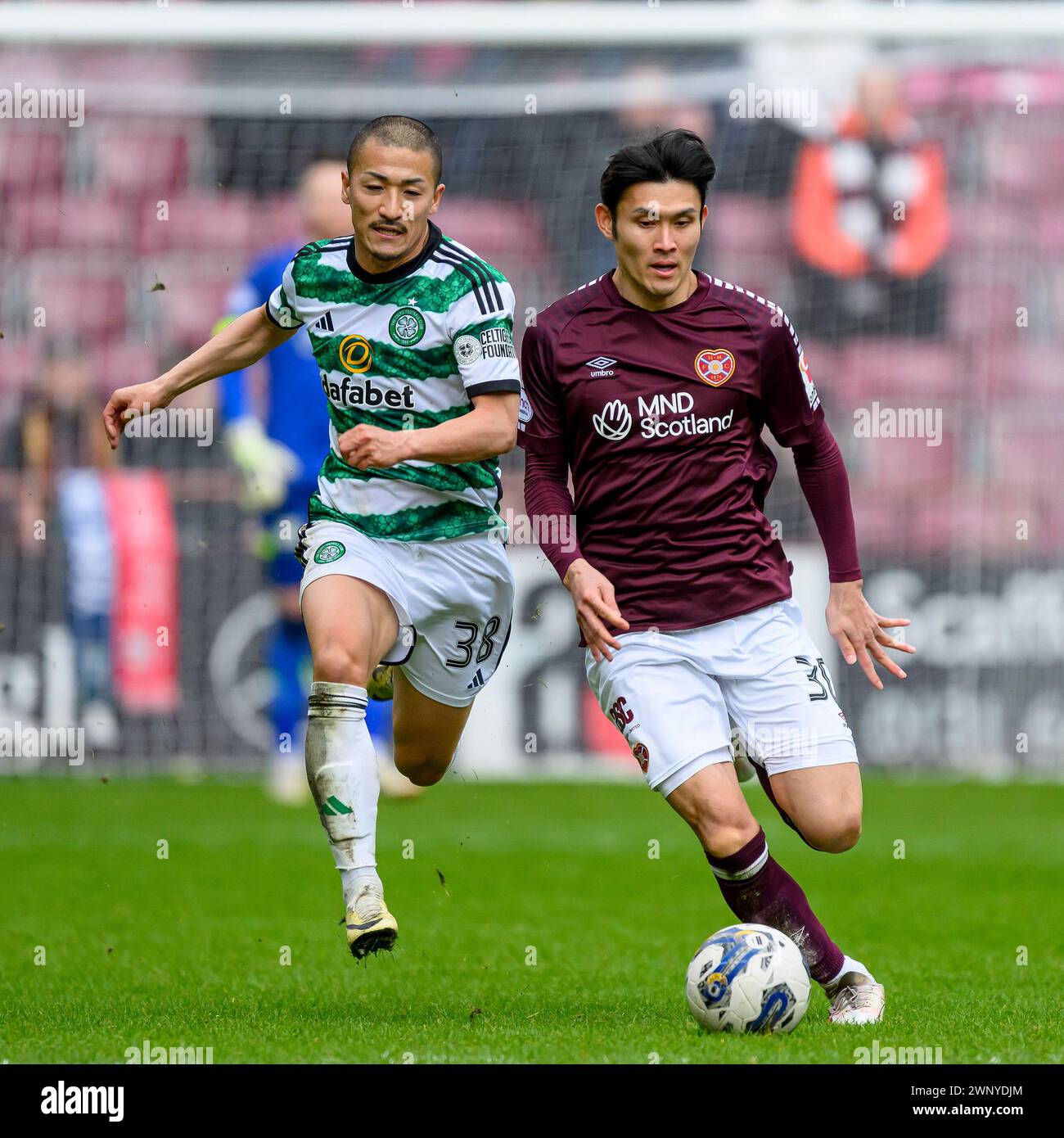 Daizen Maeda of Celtic and Kyosuke Tagawa of Hearts, Japanese players ...