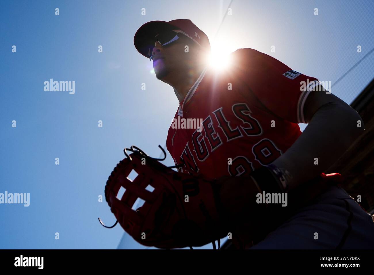 Los Angeles Angels left fielder Jordyn Adams jogs out to the field ...