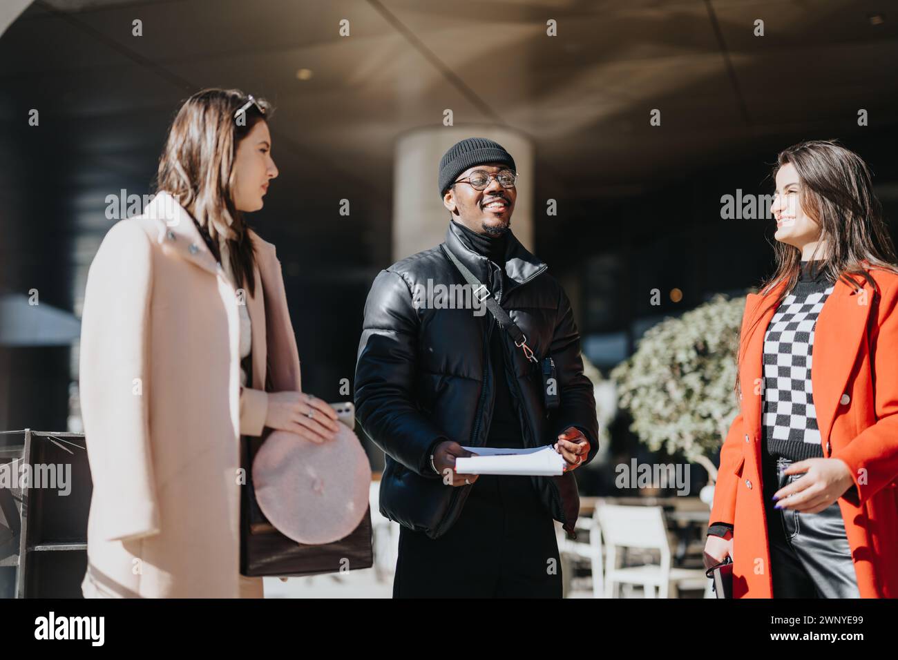 Group multiethnic friends meeting hi-res stock photography and images ...