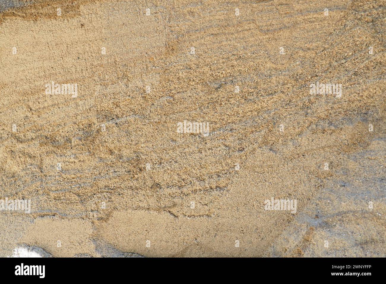Sandstone is a fragmentary sedimentary rock, a homogeneous or layered ...